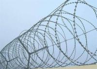 China Hot Dipped Galvanized Concertina Barbed Wire Coil BTO30 0.5mm Thickness 2.5mm Wire Diameter for sale